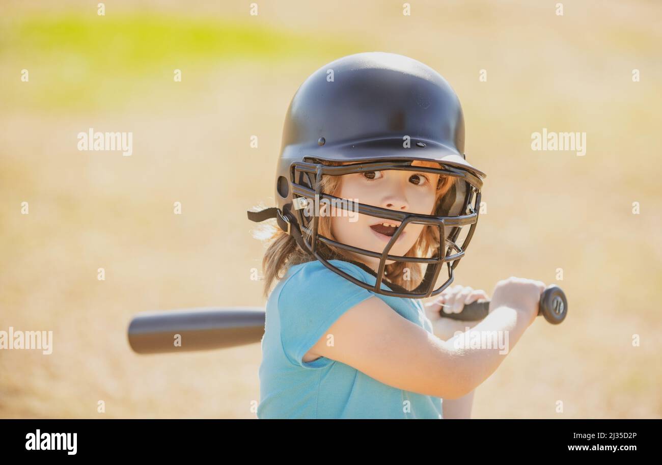 Baseball players kid swinging the bat at a fastball from the pitcher ...