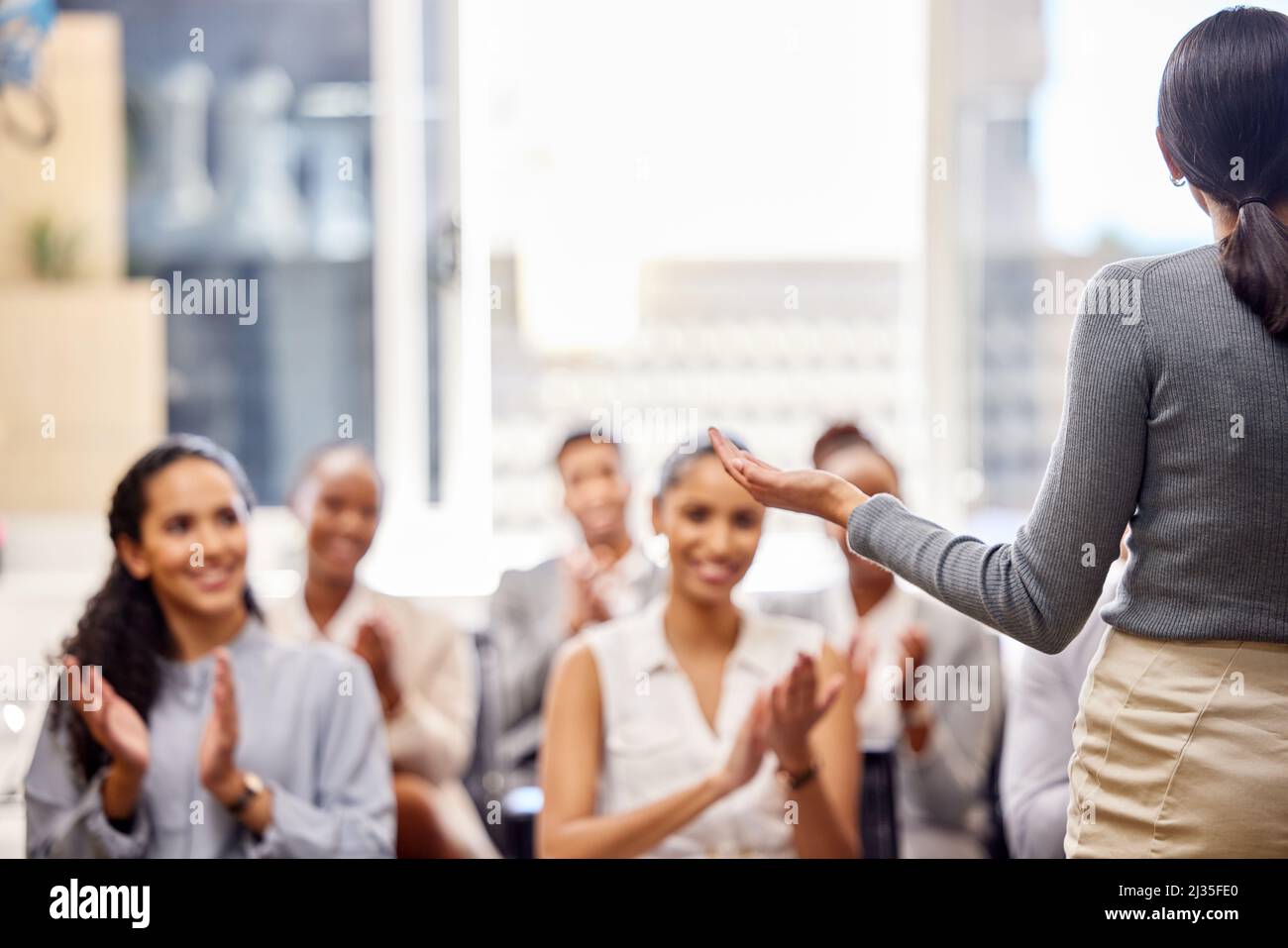 Now that deserves a round f applause. Rearview shot of an ...