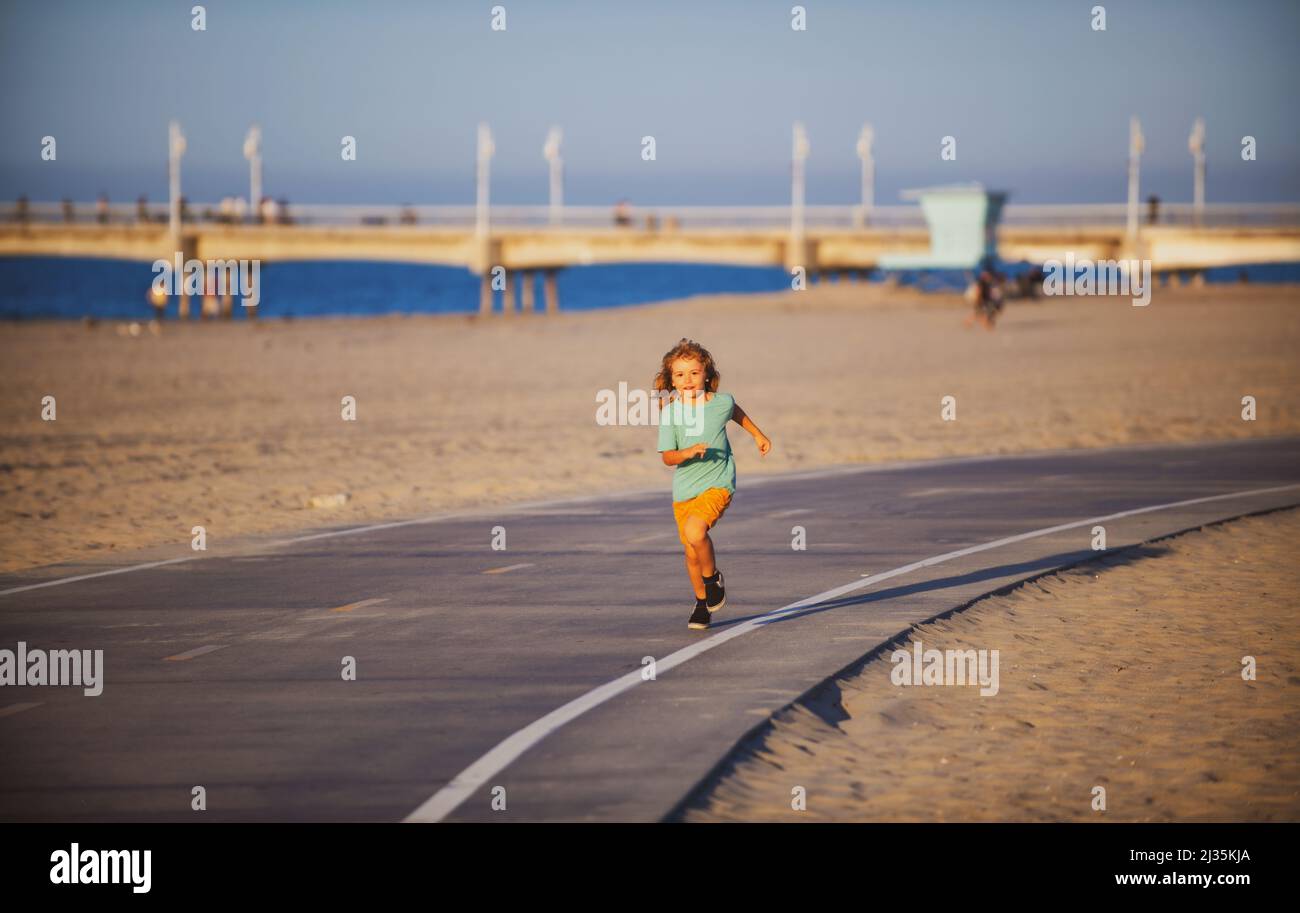 Boy kid running outdoor. Child are jump, run Stock Photo - Alamy