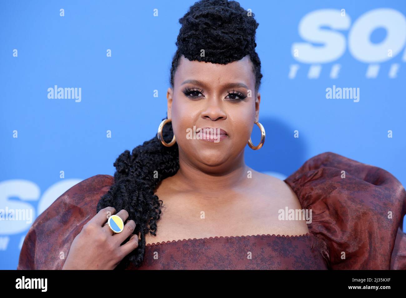 Natasha Rothwell poses wearing a ring with the colours of the Ukrainian ...