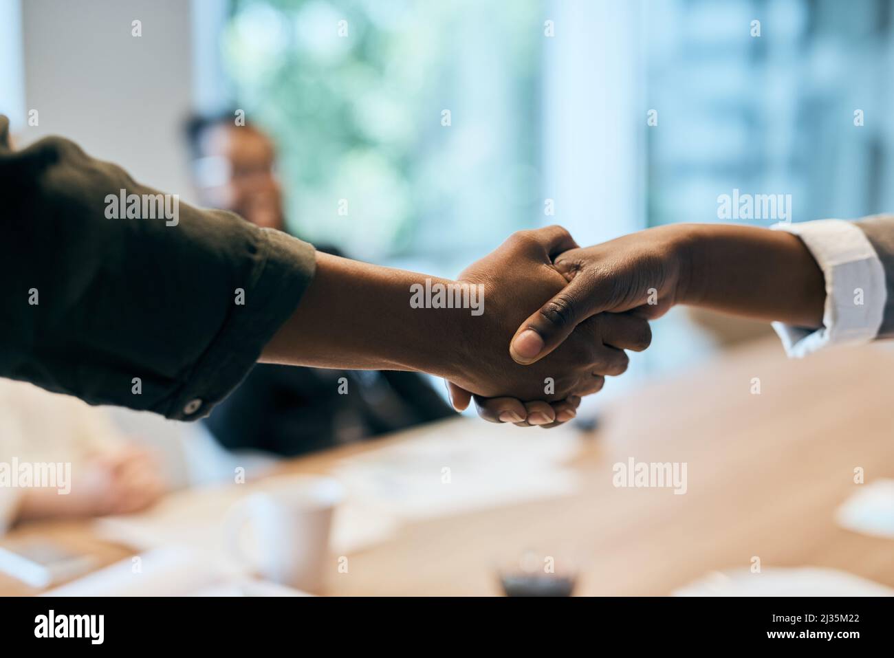 Looking forward to our next deal. Closeup of two unrecognizable ...