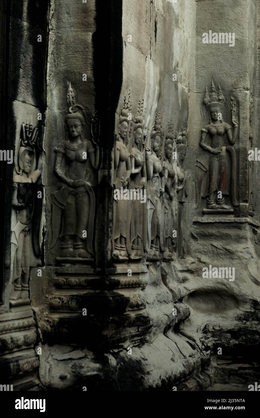 Weathered reliefs of apsara (semi-divine celestial figure, daughter of ...