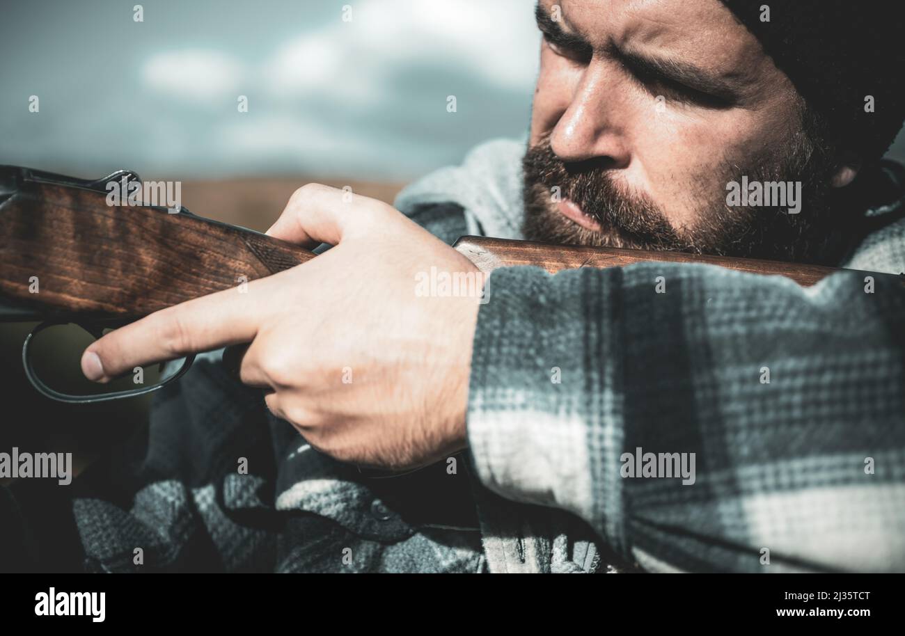 Hunting. Poacher in the Forest. Hunter with shotgun gun on hunt ...