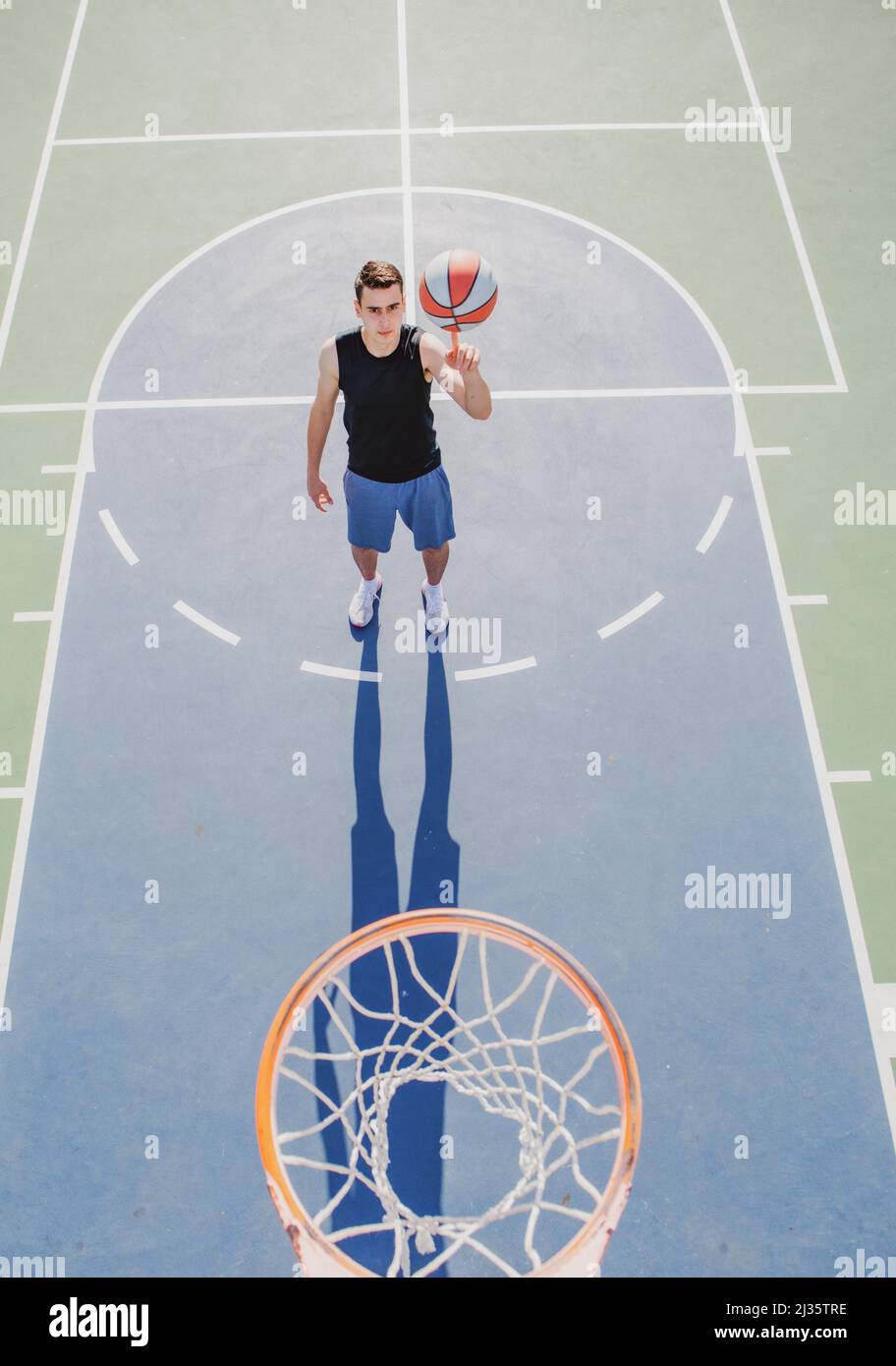 Basketball player, top view. Man playing basketball, above hoop of man ...