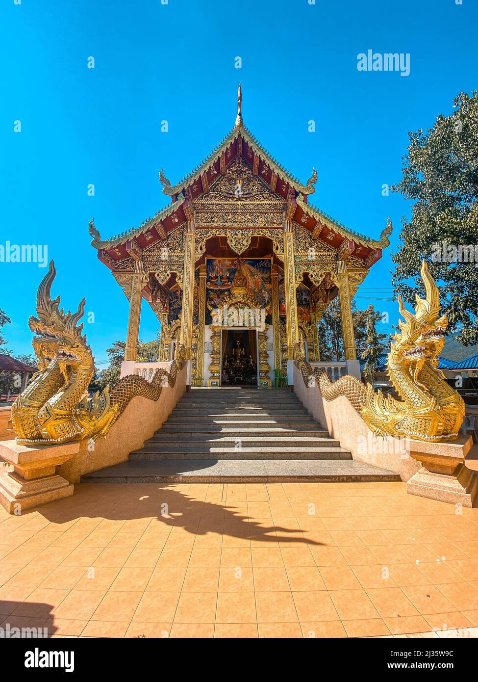 Wat phrathat doi kham temple hi-res stock photography and images - Alamy