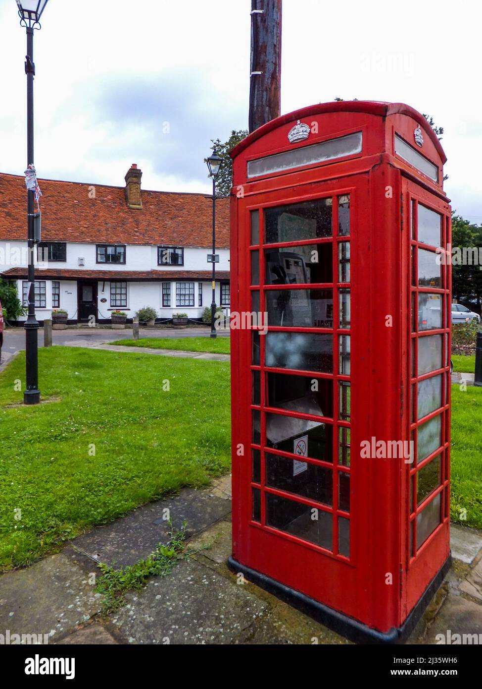 An iconic red public telephone box, or kiosk, in London, England, UK ...
