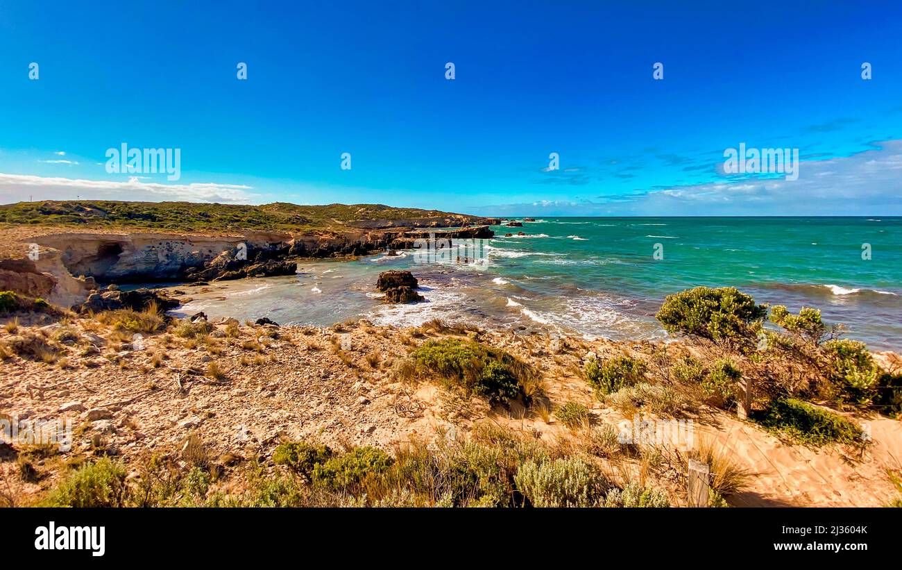 he rocks, waves and spectacular sky of the rugged isolated coastline ...