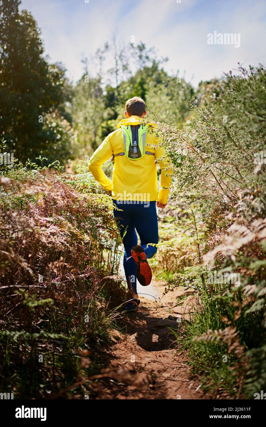 Young man running fast along hi-res stock photography and images - Alamy