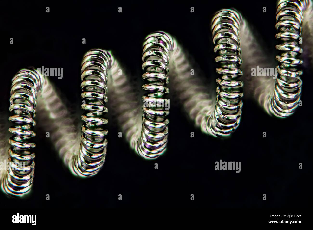 Halogen lamp filament, light micrograph Stock Photo - Alamy