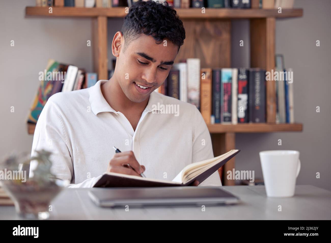 Indian man reading paper at home hi-res stock photography and images ...