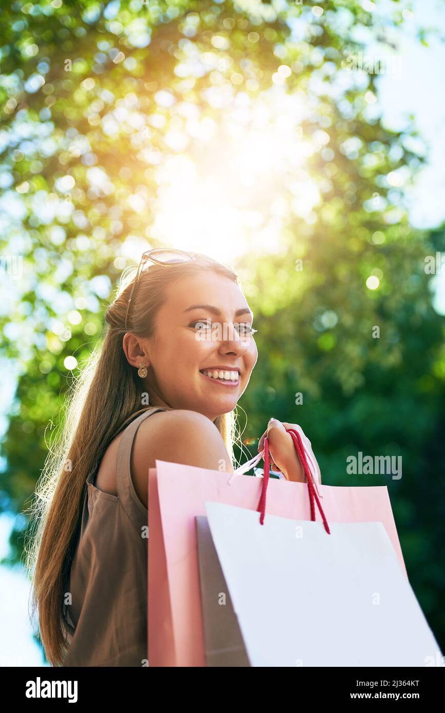 I love a good sale. Cropped portrait of an attractive young woman ...