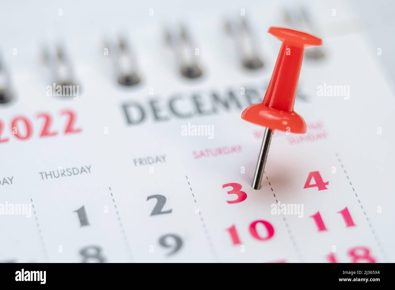 Red push pin on calendar 3th day of the month, mark the Event day with ...