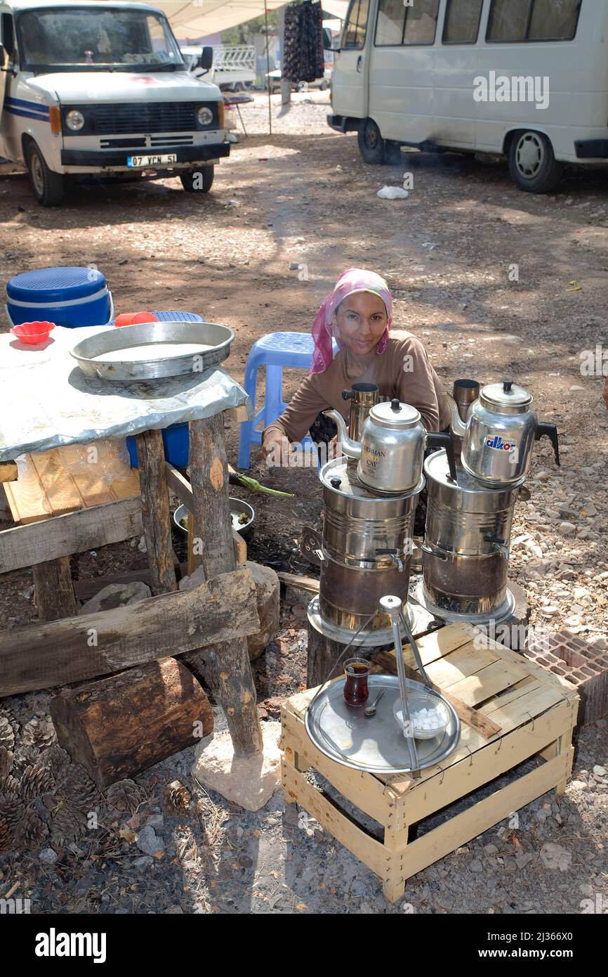 Turkish woman sells tea at Farmers market, Adrasan, Lykia, Turkey ...