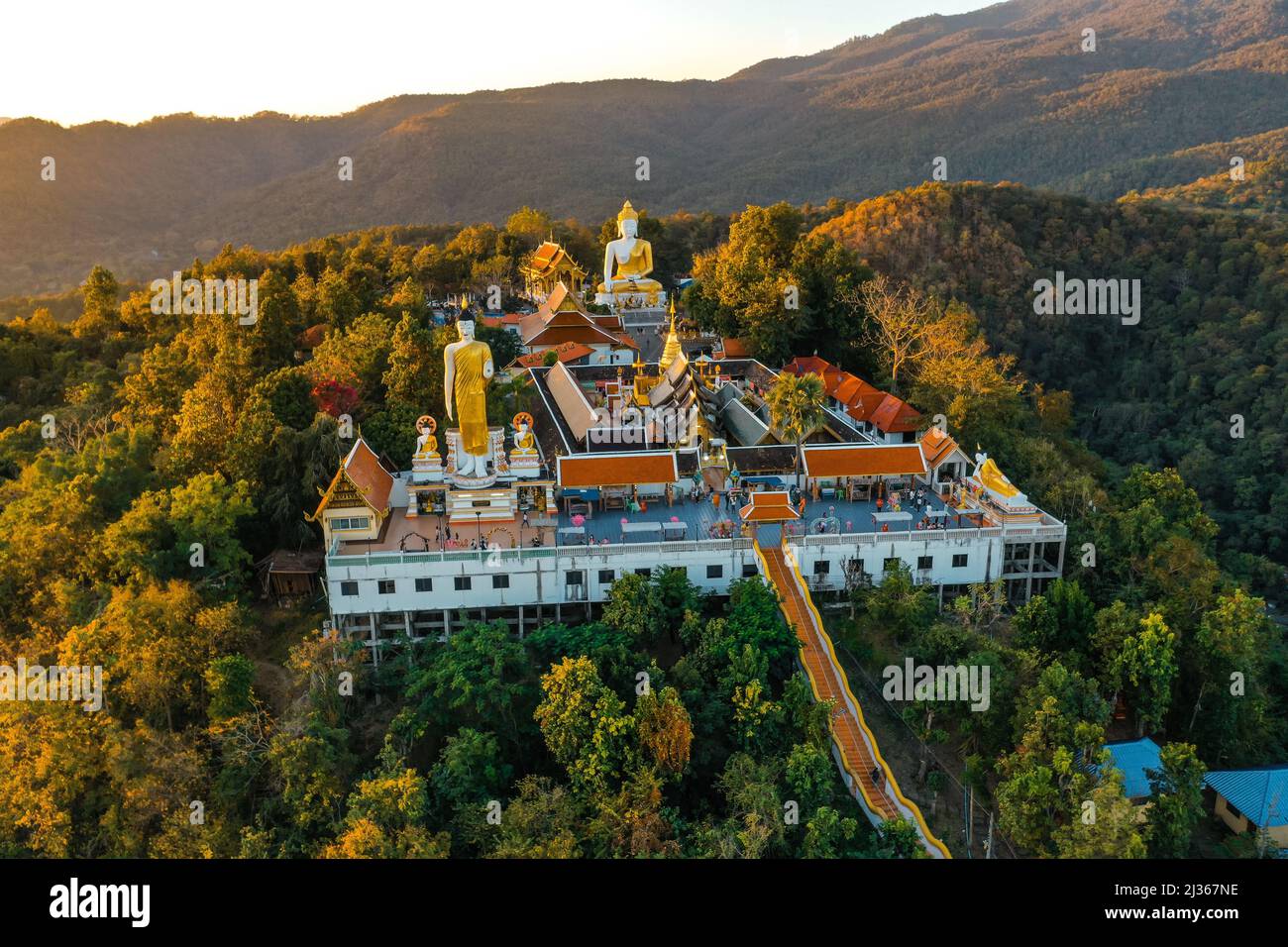 Aerial view of Wat Phrathat Doi Kham, Buddha pagoda and golden chedi in ...
