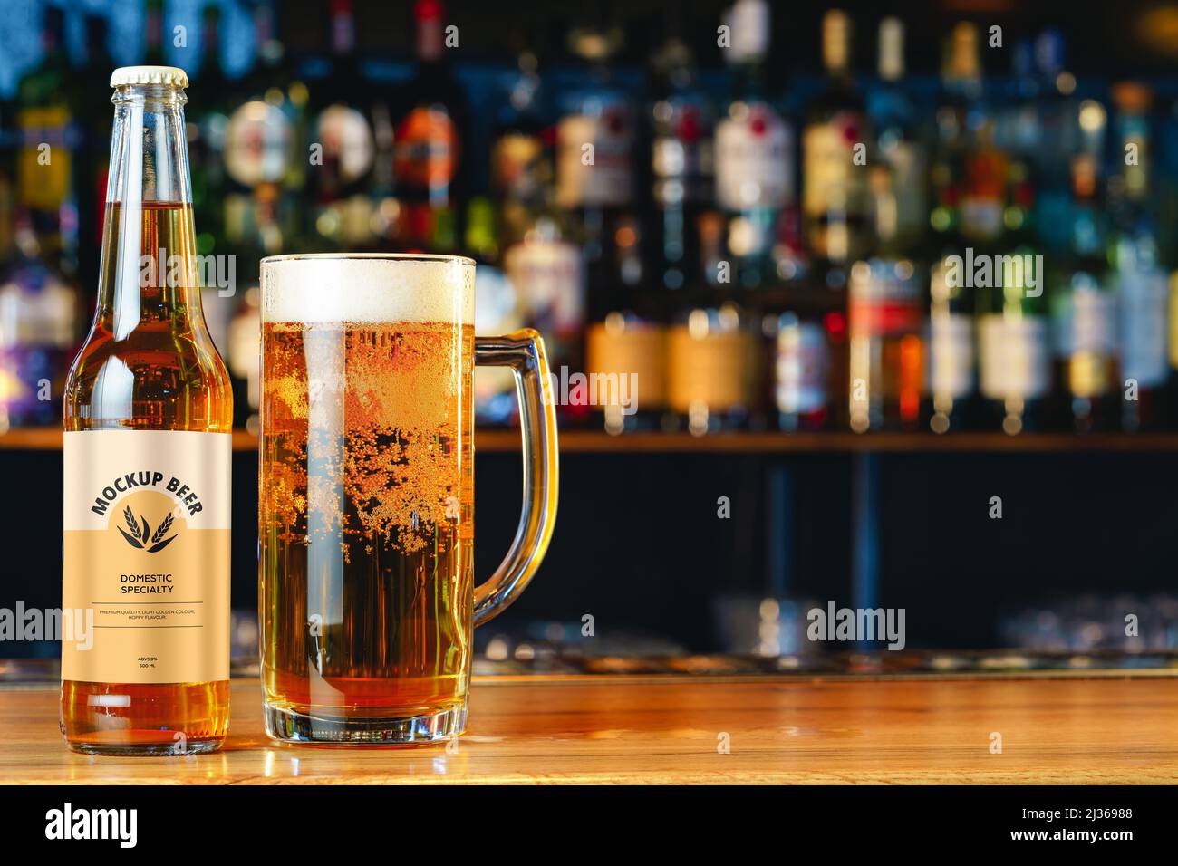 Beer bottle mock-up against blurred bar counter Stock Photo - Alamy