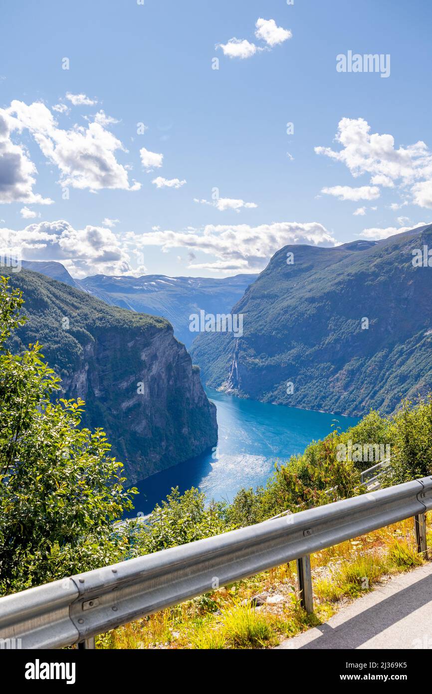 A landscape view of a bridge fence over Geirangerfjord Fjord in Norway ...