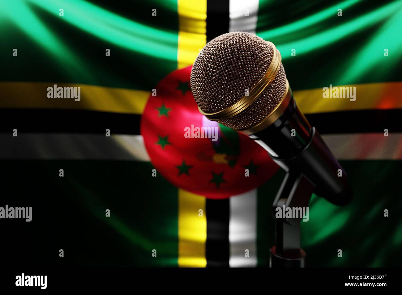 Microphone on the background of the National Flag of Dominica ...