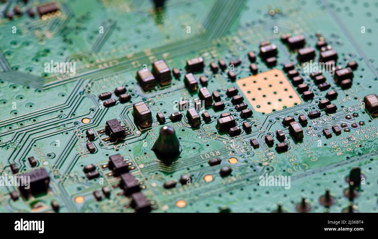 Macro Close up of printed wiring on PC circuit board of modem router ...