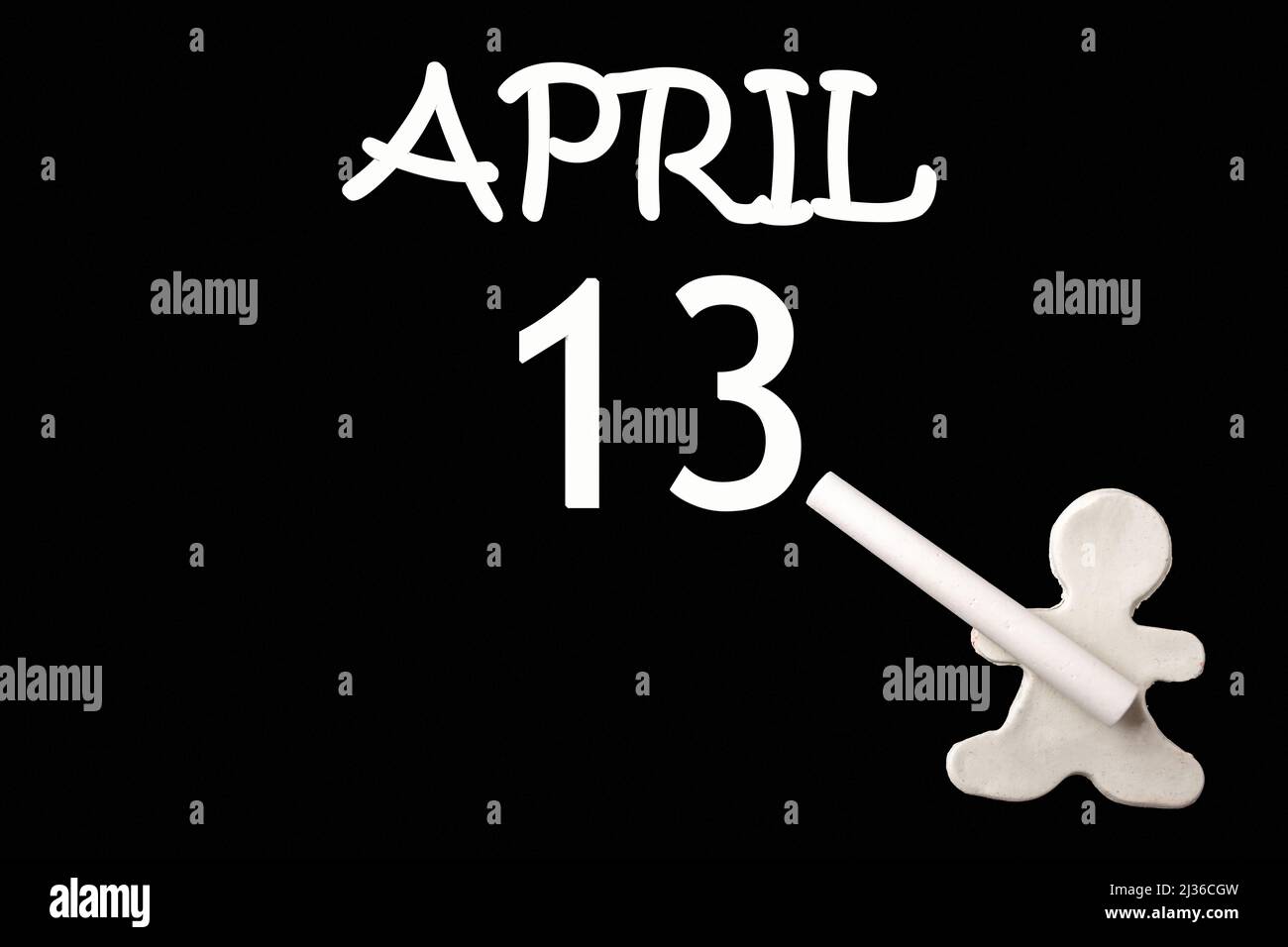 13th day of April. A small white plasticine man writing the date 13 ...