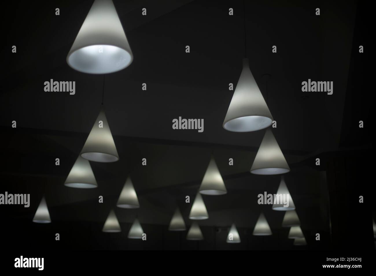 Lots of lamps on ceiling. Interior details. Light sources in room ...