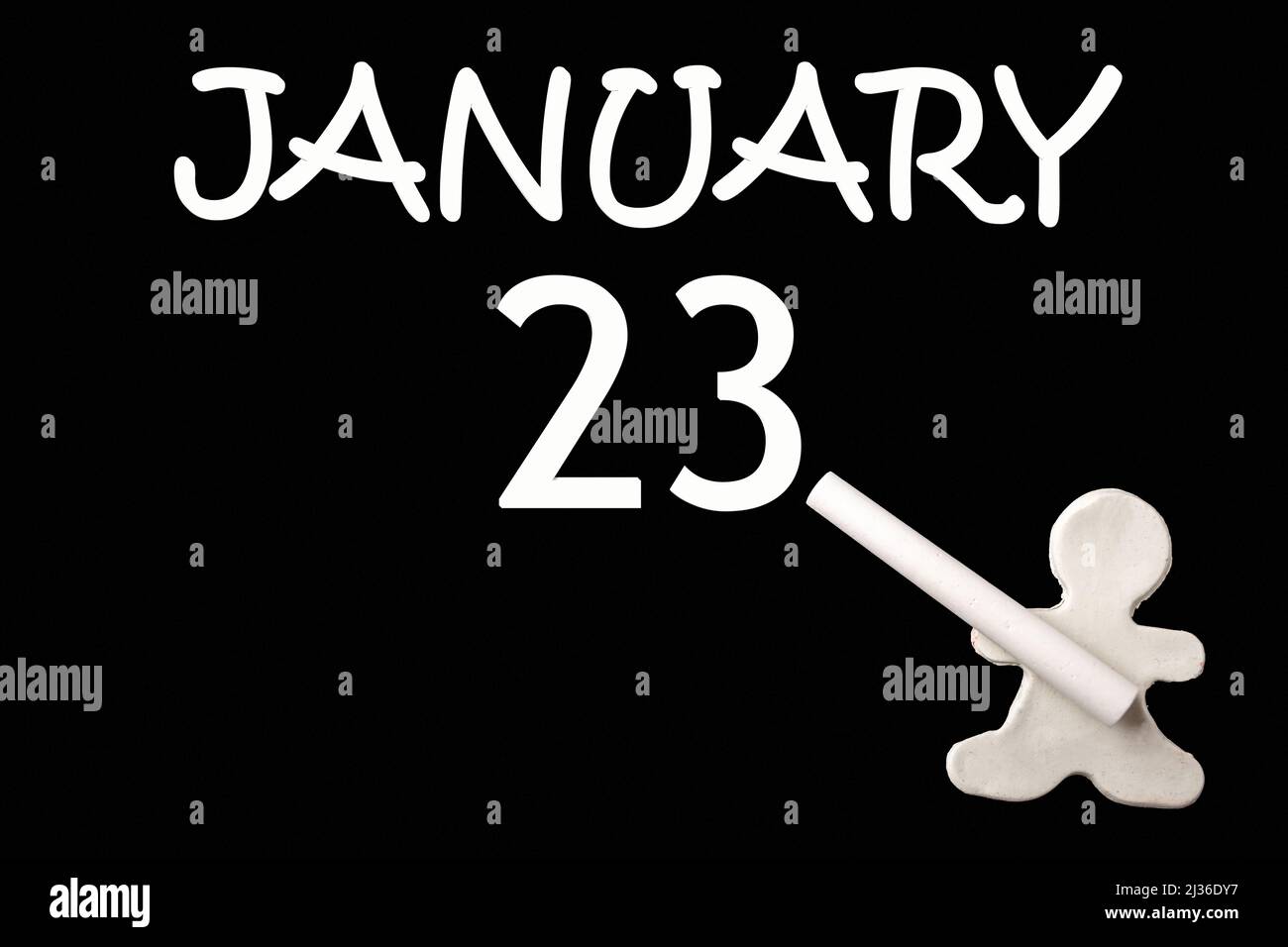 23rd day of January. A small white plasticine man writing the date 23 ...