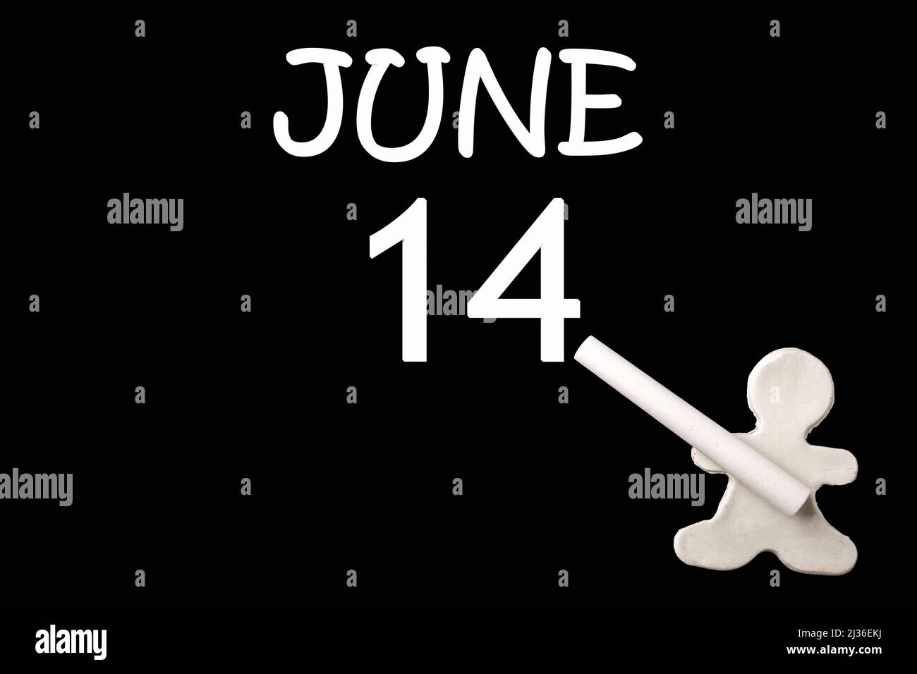 14th day of June. A small white plasticine man writing the date 14 June ...