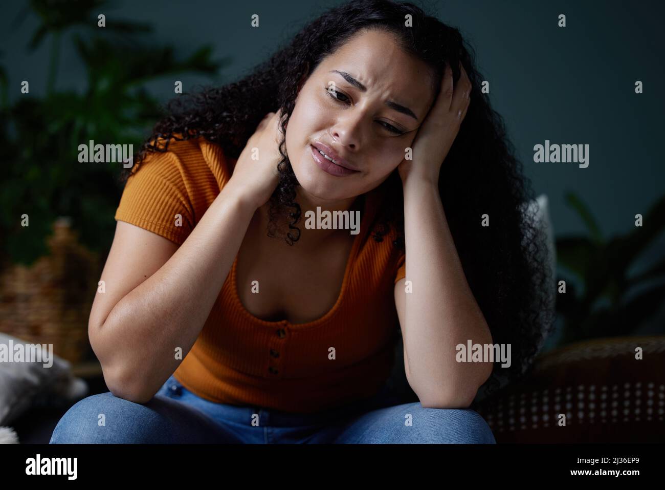 Curly brunette woman feels stress hi-res stock photography and images ...