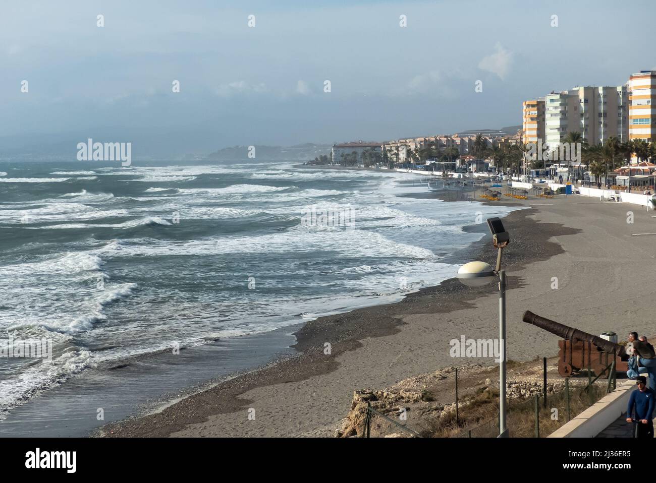 Torrox Costa in Spain: the beach with high seas Stock Photo - Alamy