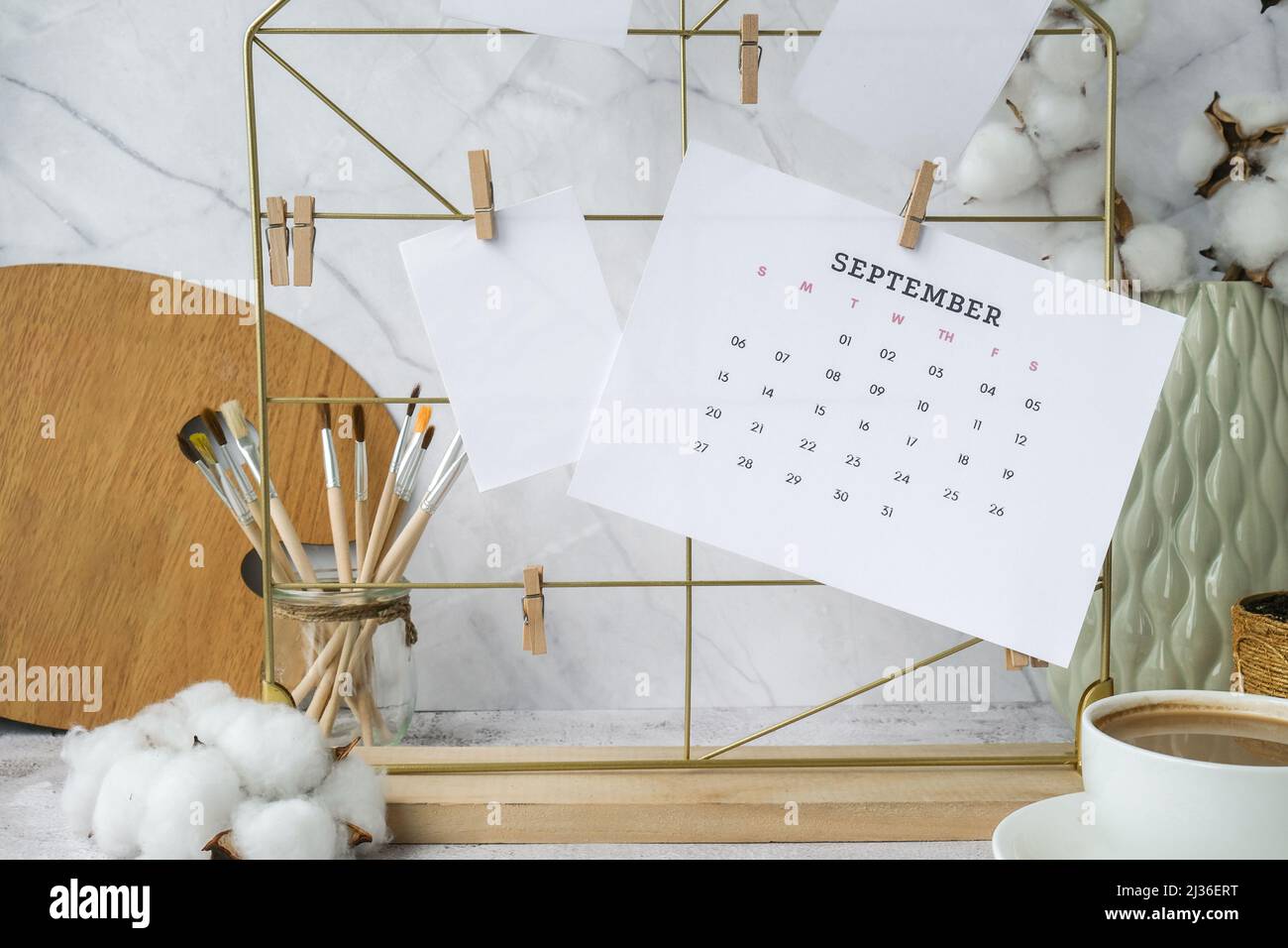 SEPTEMBER CALENDAR Cards and posters mock ups on grid board. Copy space ...