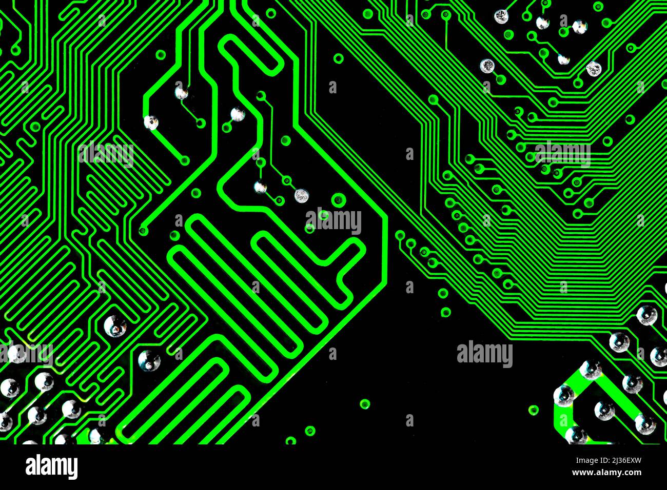 Macro Close up of printed wiring on green PC circuit board Stock Photo ...