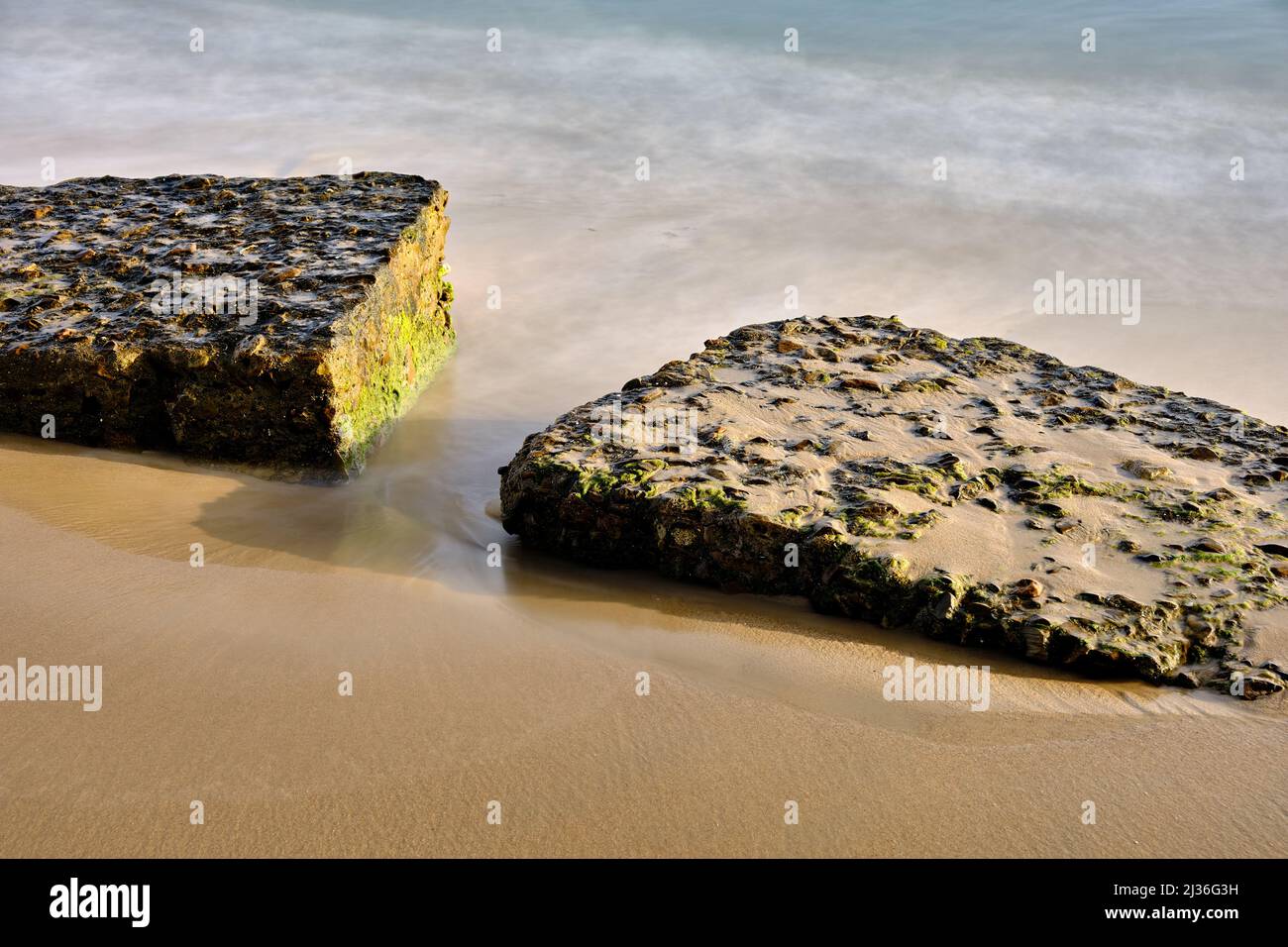 A piece of stone thrown out of the sea Stock Photo - Alamy