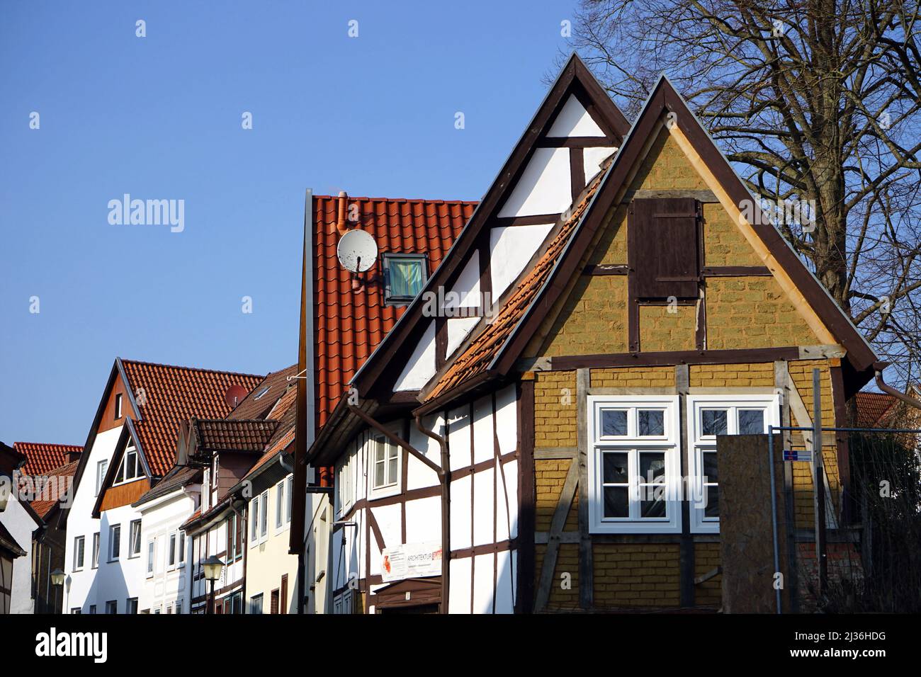 A perspective shot of residential buildings with tall roofs Stock Photo ...