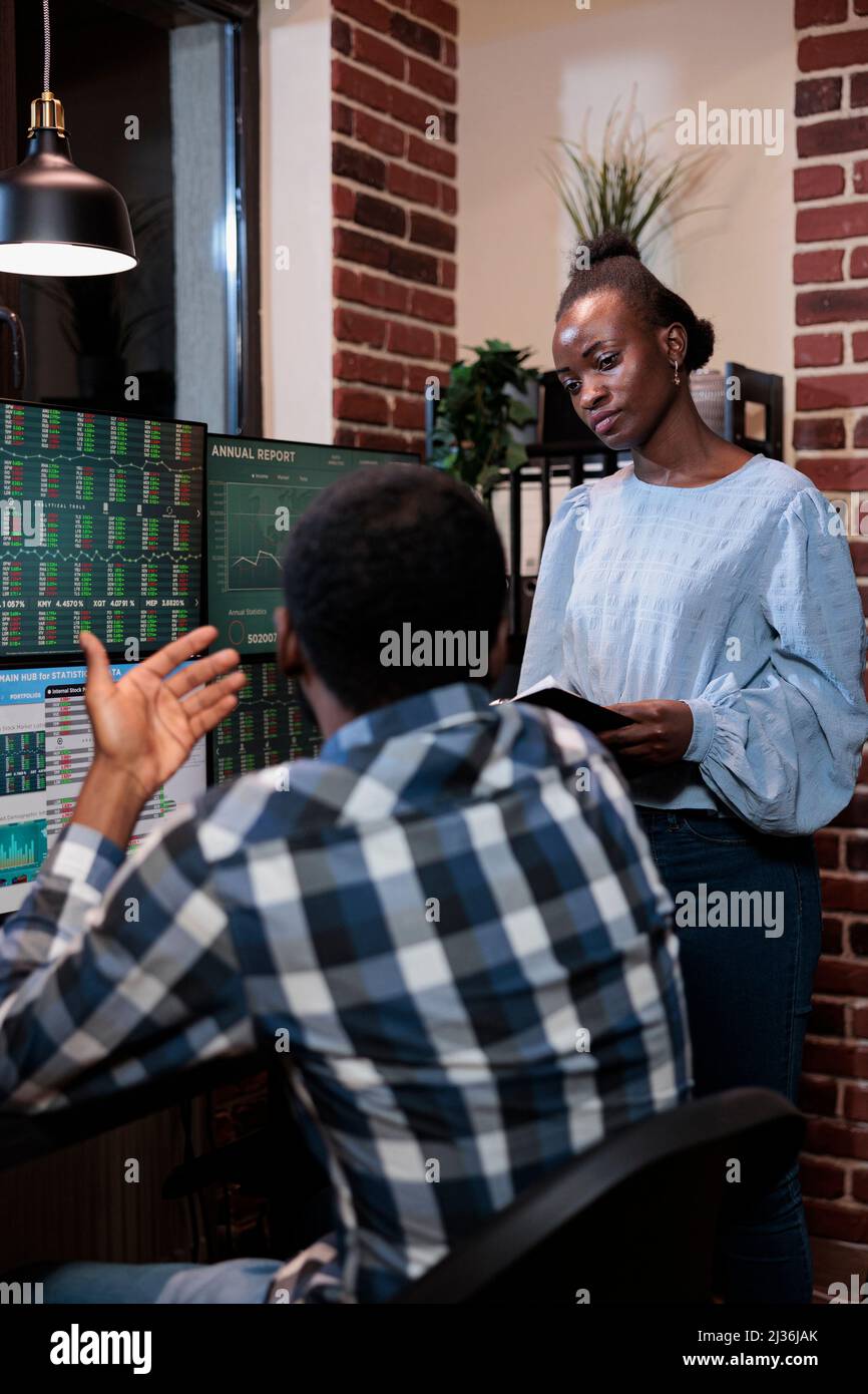 Forex stock market professional traders in office workspace discussing ...