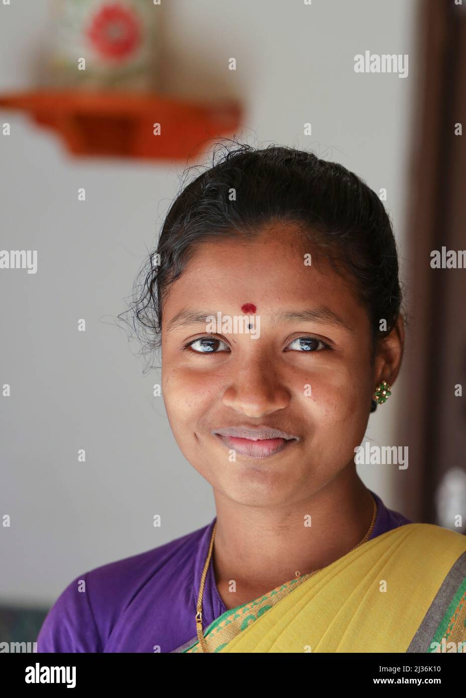 Portrait of young Indian woman at the Chidambara Vilas luxury heritage ...