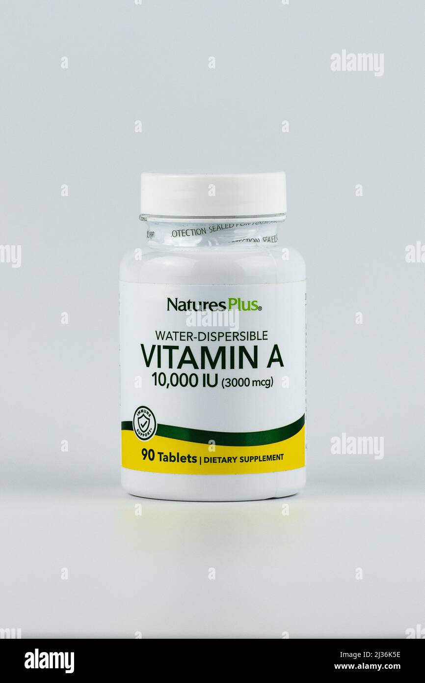 vitamin A tablets in the jar. dietary supplement vertical editorial ...