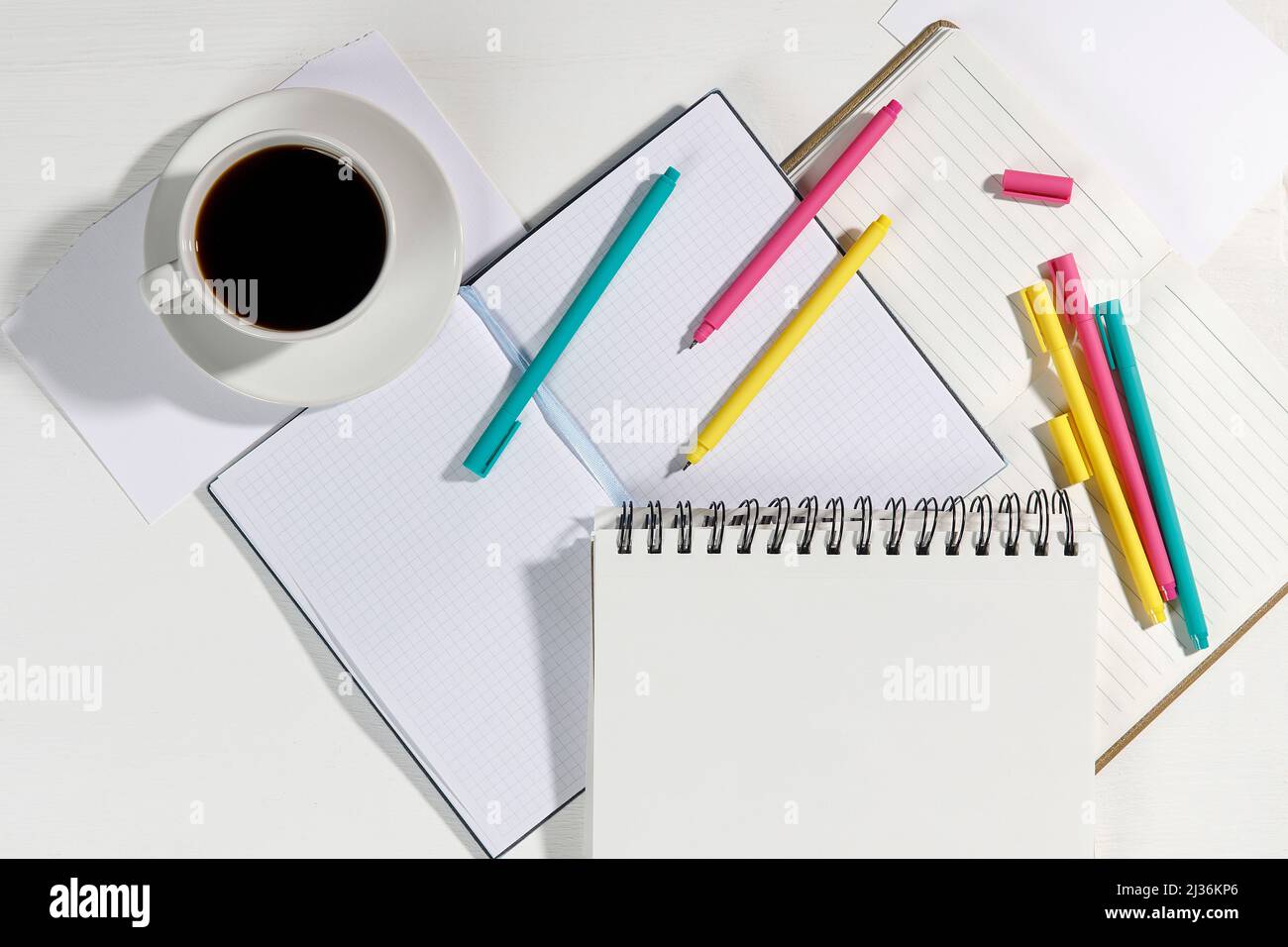 Layout for the office. Back to school. Blue notebook, colorful pens ...