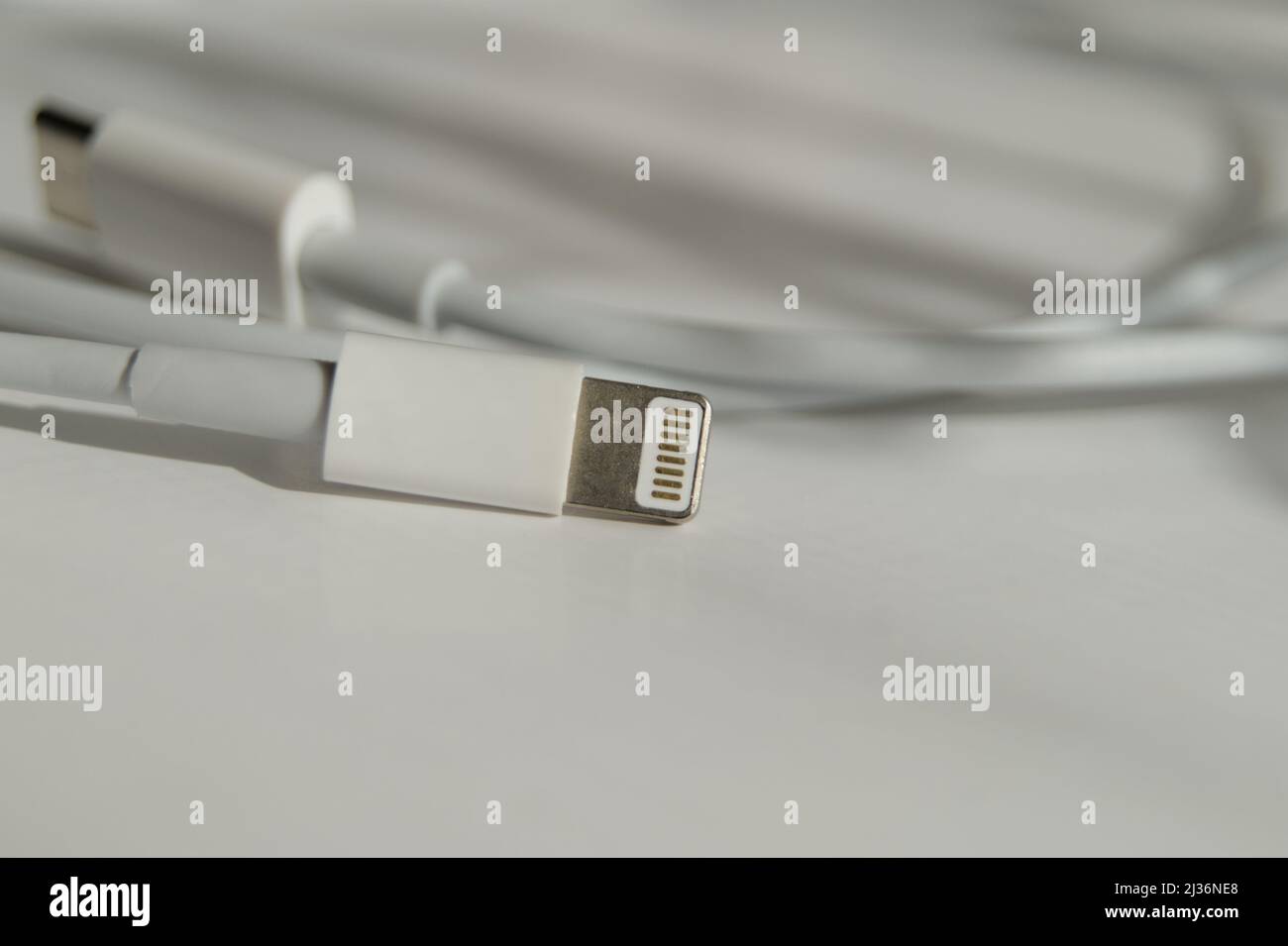 Apple Lightening Cable in White Stock Photo - Alamy