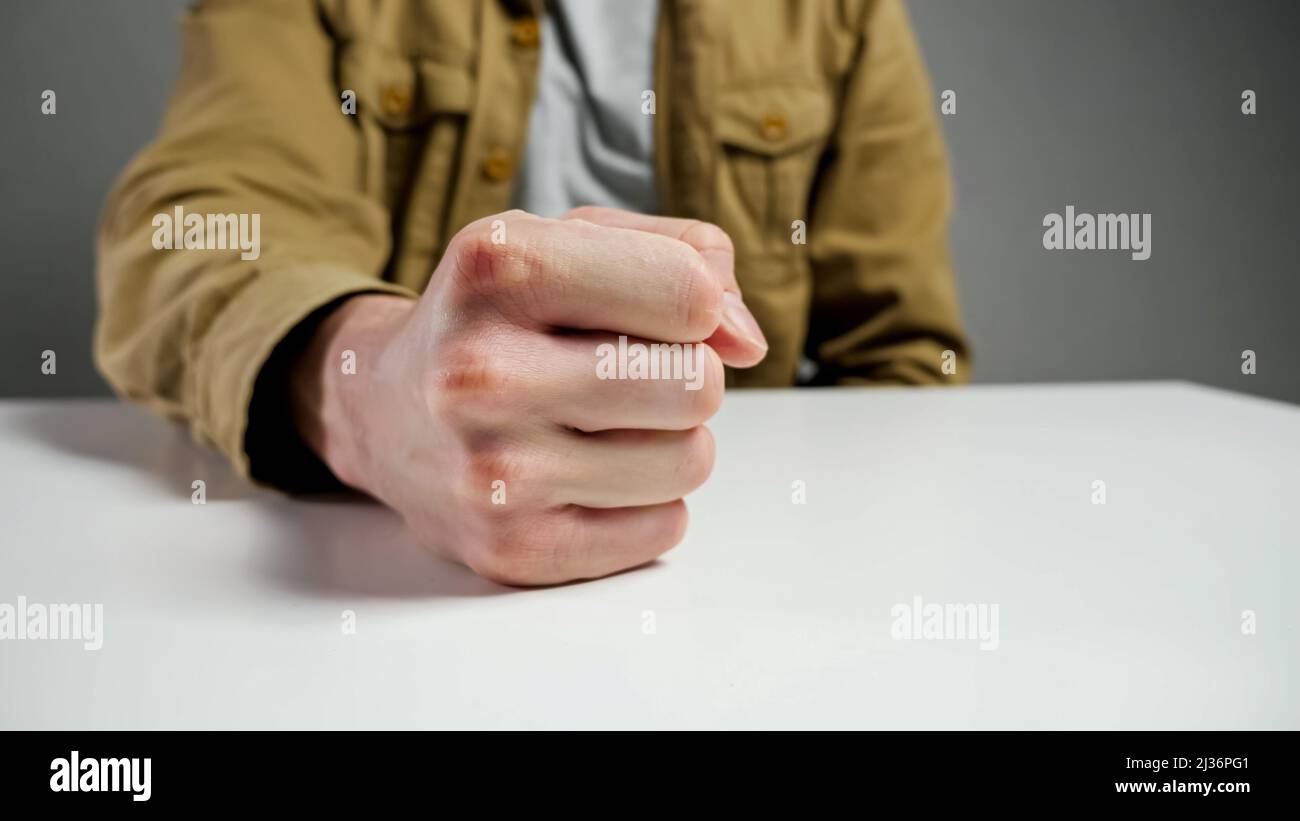 Angry man worker hits table hi-res stock photography and images - Alamy