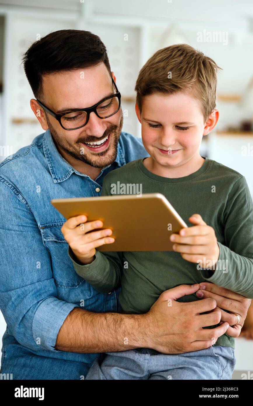 Distance learning, online education, home work concept. Family with ...