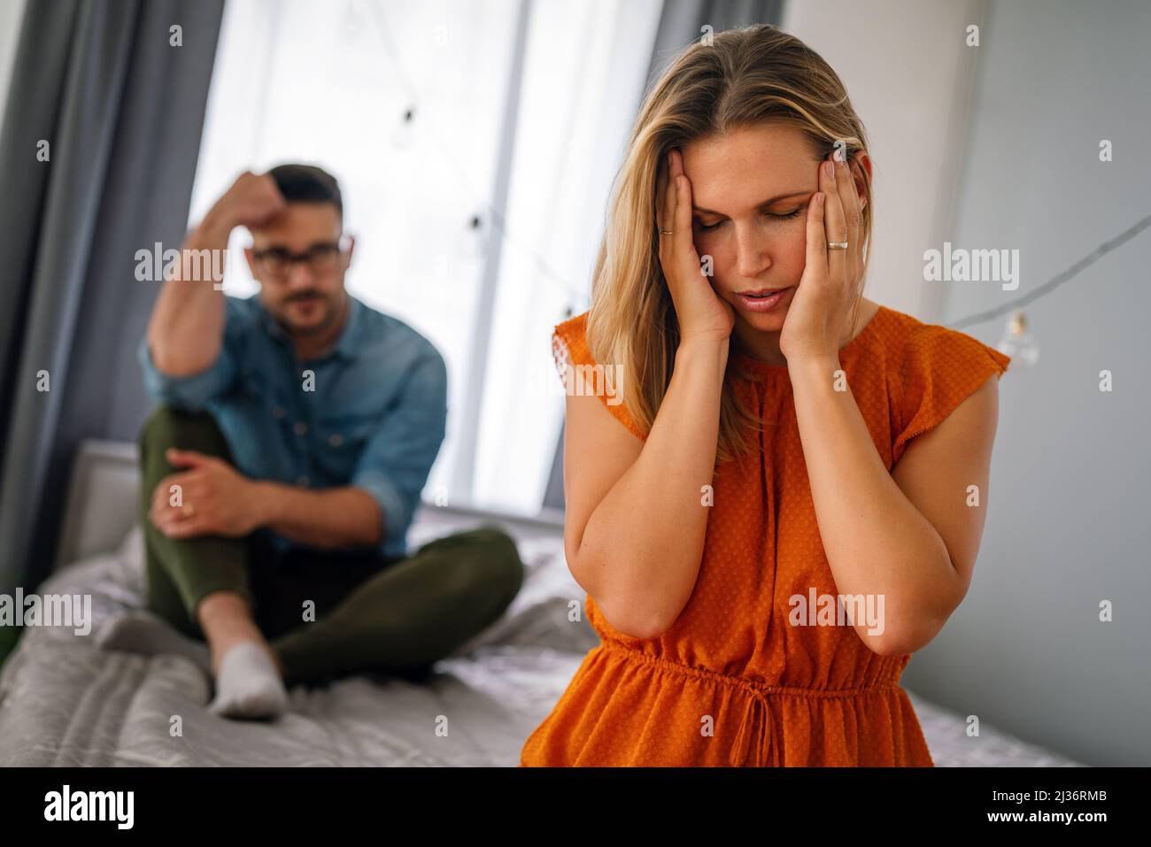 Frustrated young couple arguing and having marriage problems. Divorce ...