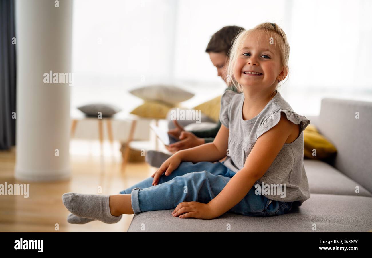 Portrait of happy little girl smiling and having fun at home Stock ...