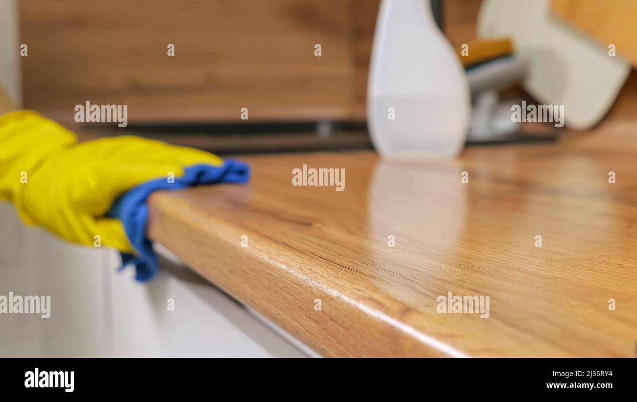 Man wipes kitchen countertop rag hi-res stock photography and images ...