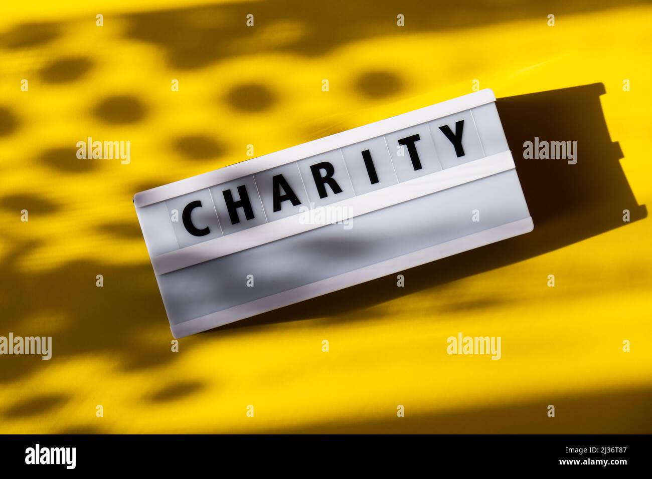 Lightbox with text CHARITY. Motivational Words Quotes Concept. Colorful ...