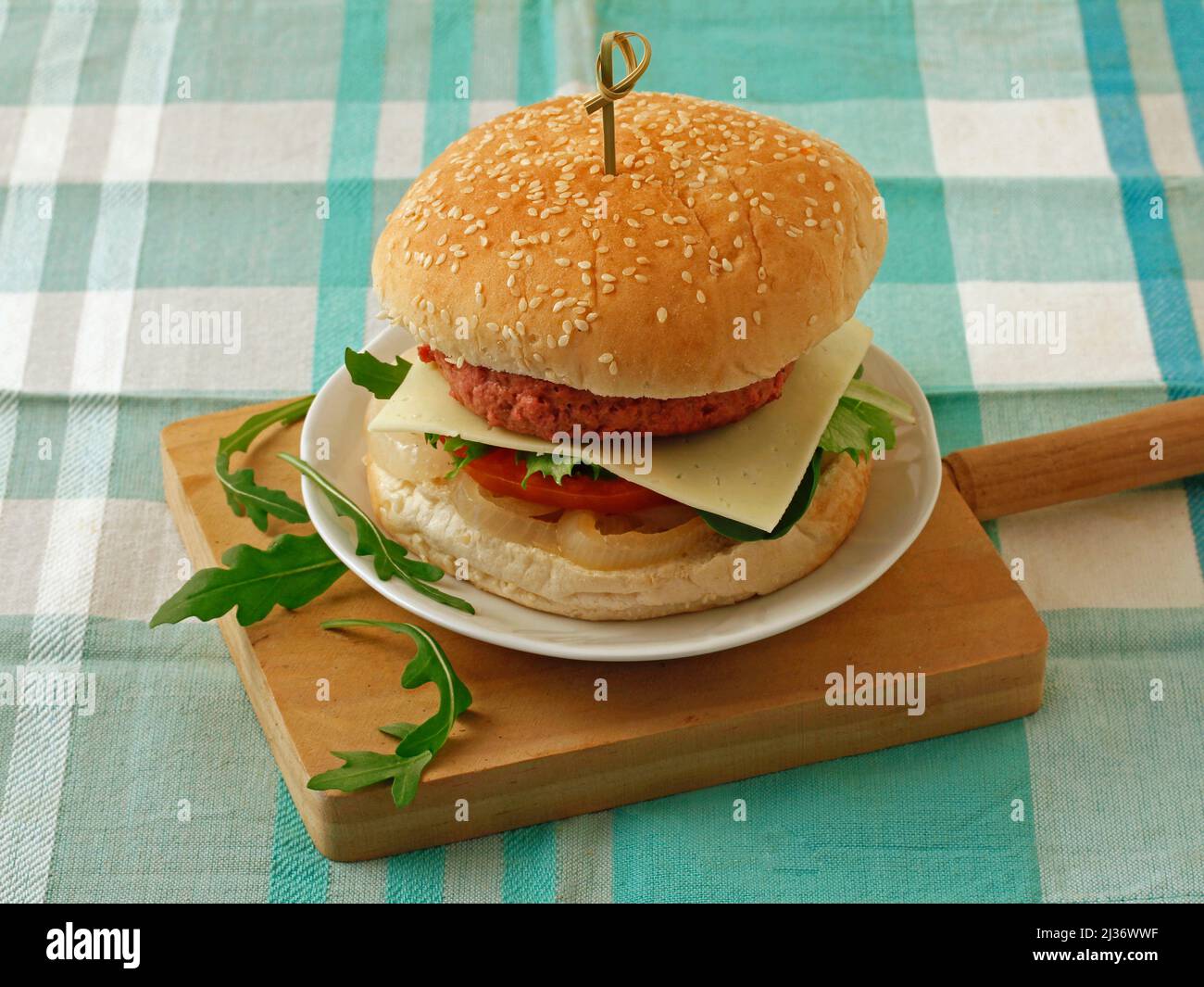 Vegan burger. Based on soy flour and wheat protein. Cheese based on ...