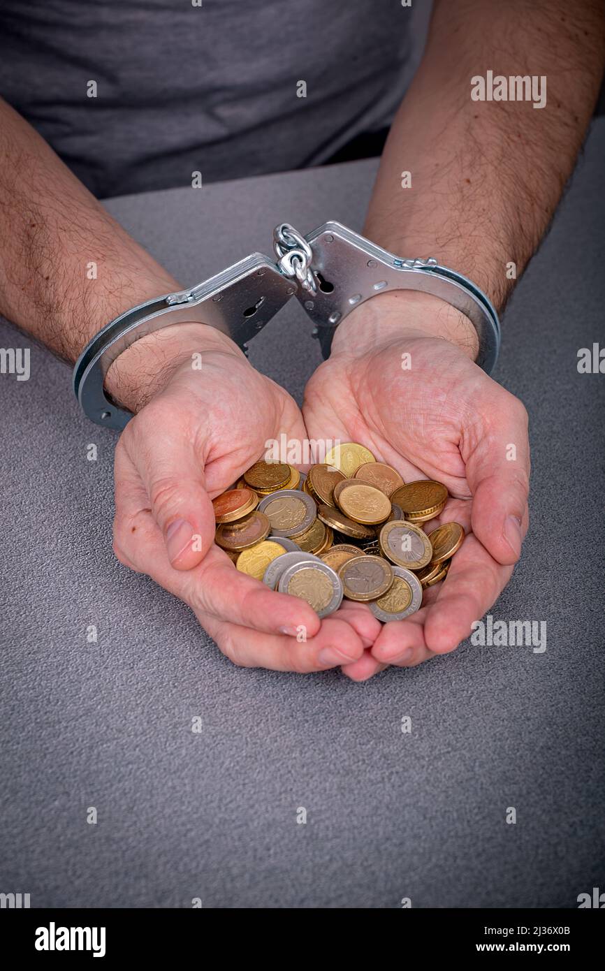 Handful of coins hi-res stock photography and images - Alamy