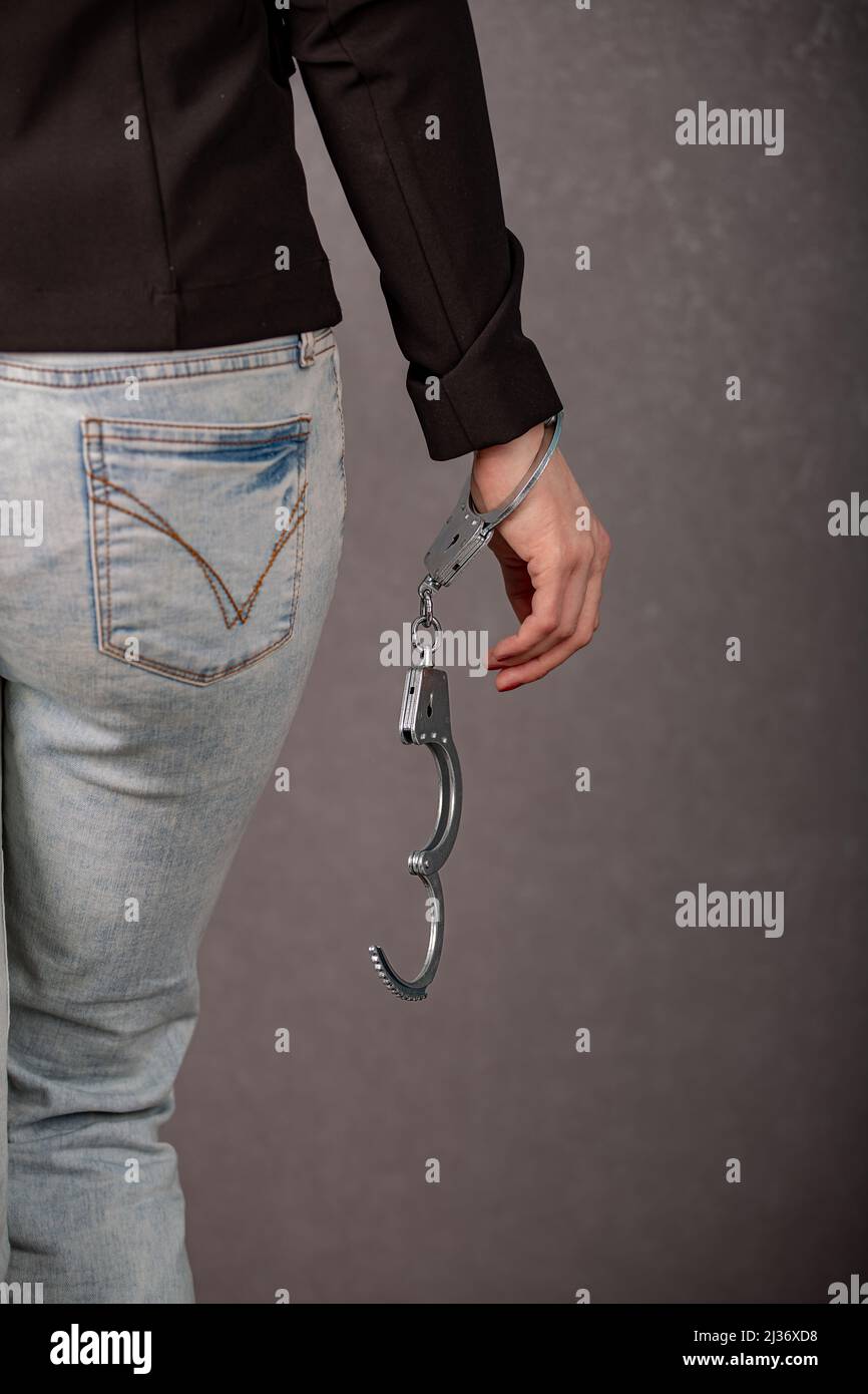Handcuff man woman hi-res stock photography and images - Alamy