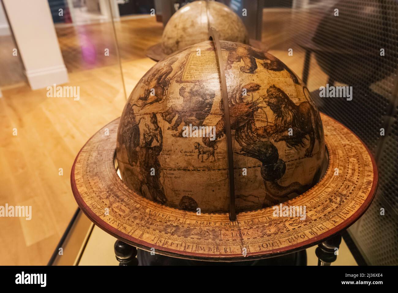 Exhibit of historical globes showing the earth heavens dated 1600 hi-res stock photography and ...