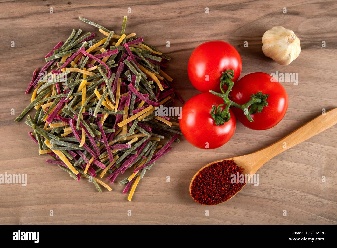 Traditional Turkish colors noodles with tomato, garlic and pepper on ...