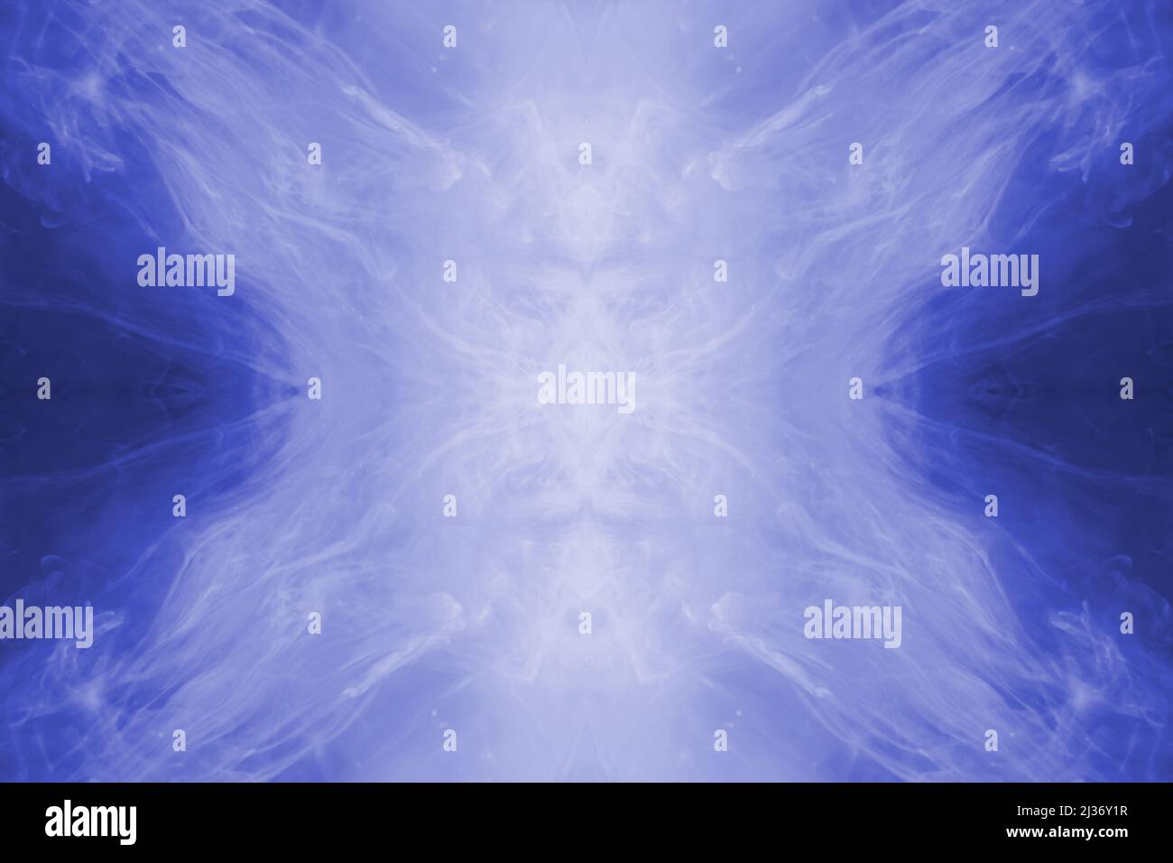 Blue ink forming patterns resembling Rorschach Test ink blots Stock ...