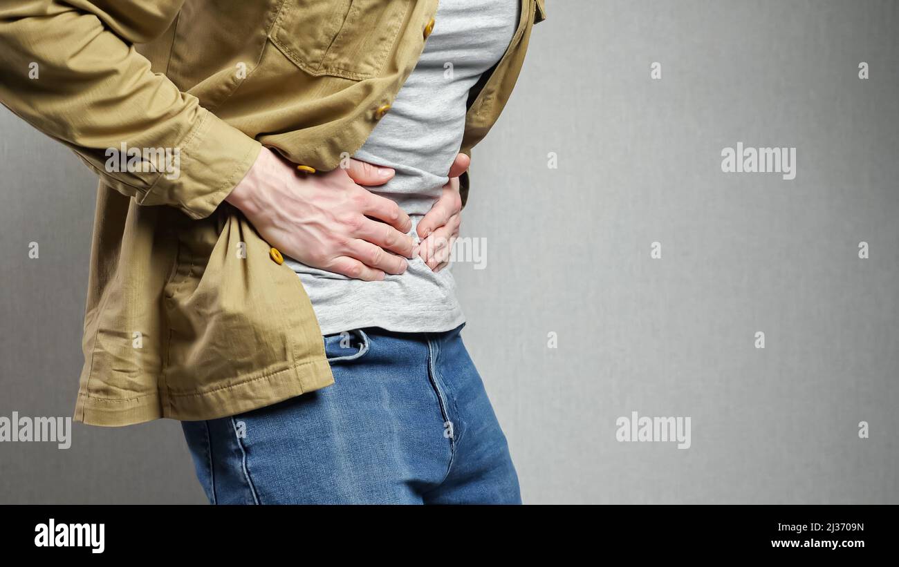 Hospital man pain stomach hi-res stock photography and images - Alamy